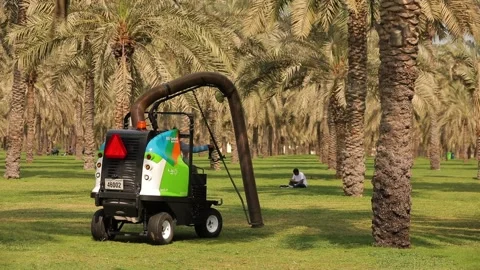 A huge vacuum cleaner on the buggy clean... | Stock Video | Pond5