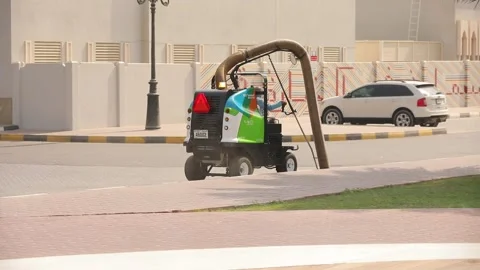 A huge vacuum cleaner on the buggy clean... | Stock Video | Pond5