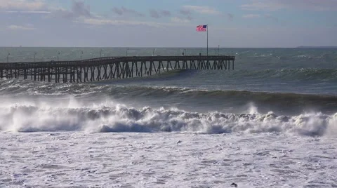 Huge waves crash on a California beach d... | Stock Video | Pond5