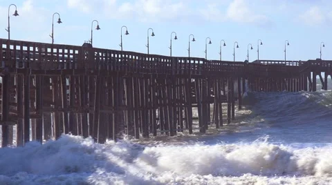 Huge waves crash on a California beach a... | Stock Video | Pond5