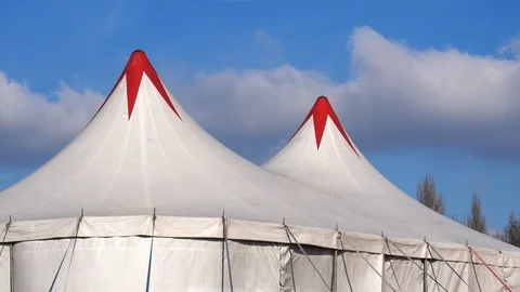 Huge white tent with double cone roof | Stock Video | Pond5