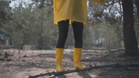 Human body in yellow rubber boots and co... | Stock Video | Pond5