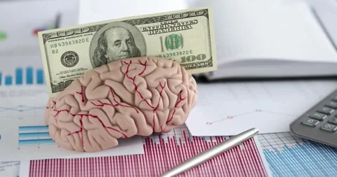 Human brain of dollar bill lying on tabl... | Stock Video | Pond5