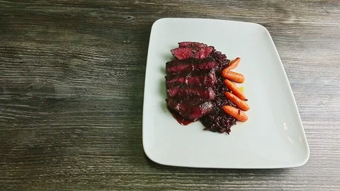 human hand rotates modern plate with sli... | Stock Video | Pond5