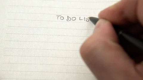Human hand writing tasks on to do list, ... | Stock Video | Pond5