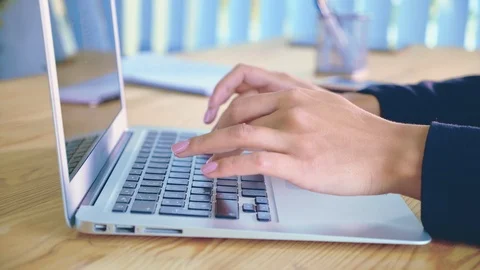 Human hands working on laptop on office ... | Stock Video | Pond5