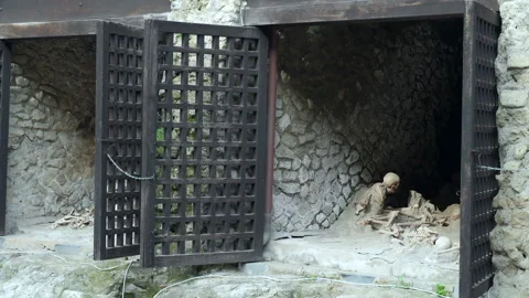 Human skeleton remains covered in volcan... | Stock Video | Pond5