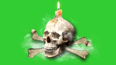 Human skull green screen with candles on... | Stock Video | Pond5