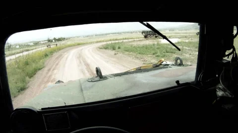 Humvee while driving in a convoy taking ... | Stock Video | Pond5