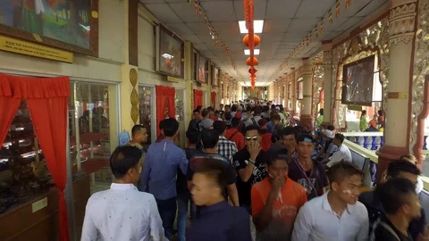 Hundred of people happily go to the temp... | Stock Video | Pond5