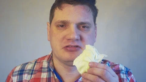 hungry sad man eating raw cabbage | Stock Video | Pond5