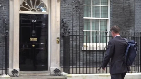 Hunt arrives at Downing Street as Sunak ... | Stock Video | Pond5