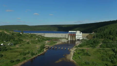 Hydroelectric dam with water flows throu... | Stock Video | Pond5