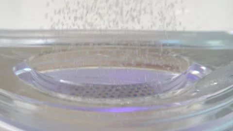 Hydrogen gas H2 is raising from mesh gri... | Stock Video | Pond5