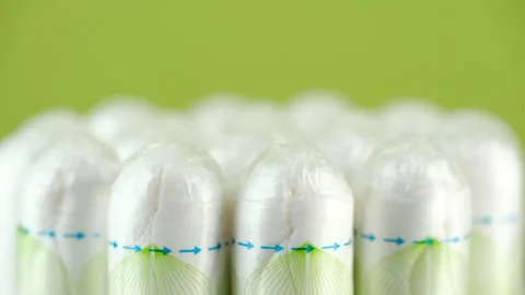 Hygienic Female tampons isolated on gree... | Stock Video | Pond5