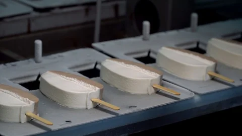 Ice-cream production line. Desserts on c... | Stock Video | Pond5