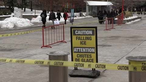 Ice falling hazard warning signs near ta... | Stock Video | Pond5