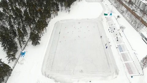 Ice hockey rink in the city park, aerial... | Stock Video | Pond5