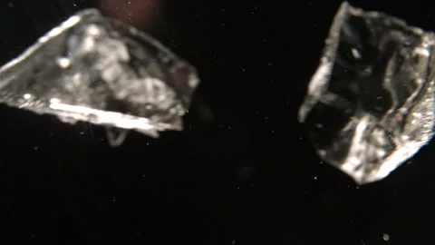 Ice Moving Across Screen In Black Space.... | Stock Video | Pond5