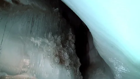 Ice stalactites and stalagmites in ice c... | Stock Video | Pond5
