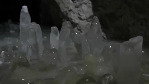 Ice stalagmites inside the cave. close u... | Stock Video | Pond5