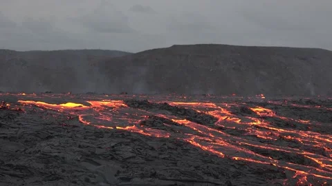 Iceland. Volcano eruption. Flowing lava ... | Stock Video | Pond5