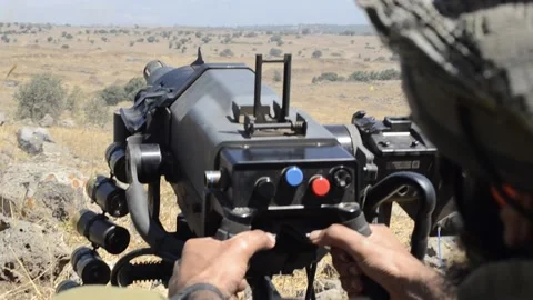 IDF soldier shooting a grenade machine g... | Stock Video | Pond5