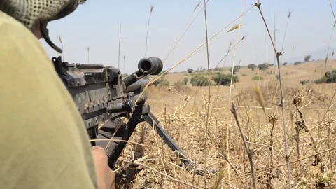 IDF soldiers shooting a MAG machine gun | Stock Video | Pond5
