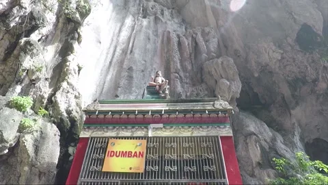 Idumban statue at limestone cliff wall i... | Stock Video | Pond5