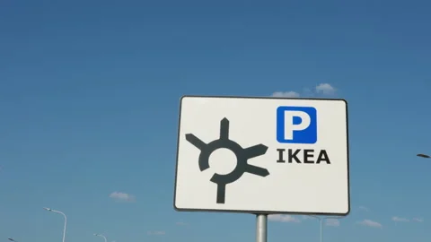 Ikea car parking sign towering next to a... | Stock Video | Pond5