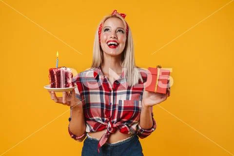 Photograph: Image of happy pinup girl posing with gift box and birthday ...