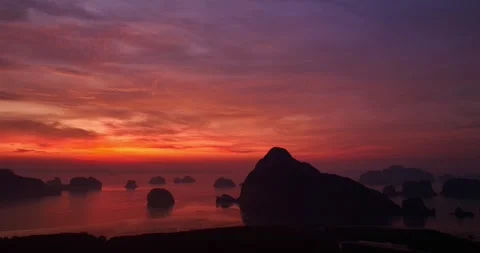 Imagine the beautiful bright red sky at ... | Stock Video | Pond5