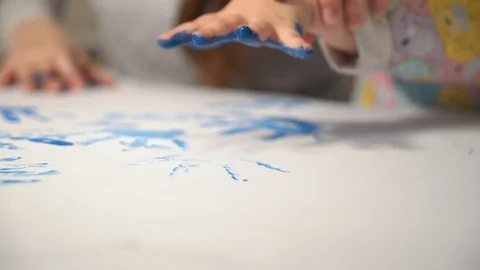 Imprint of children's hands made with pa... | Stock Video | Pond5