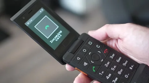 Incoming Call on a Vintage Flip Phone Re... | Stock Video | Pond5