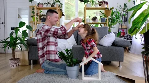 Incomplete family dad and daughter are e... | Stock Video | Pond5