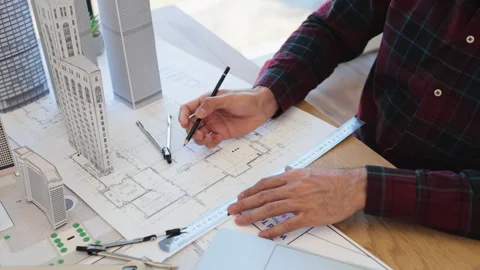 Indian architect measuring city plan for... | Stock Video | Pond5