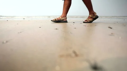 indian boy walking profile on beach sand... | Stock Video | Pond5