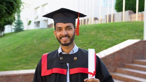 Indian college graduate in cap and gown ... | Stock Video | Pond5
