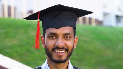 Indian college graduate in cap and gown ... | Stock Video | Pond5