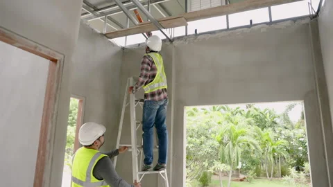 Indian construction worker Climb ladder ... | Stock Video | Pond5