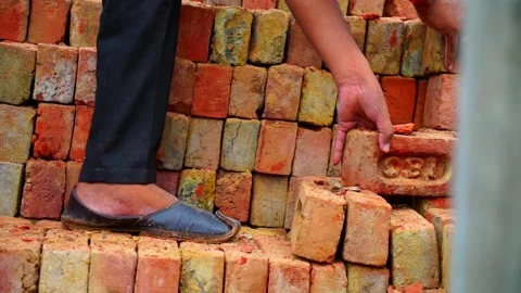 Indian construction workers unloading br... | Stock Video | Pond5