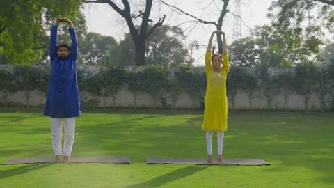 Indian couple doing full body exercise i... | Stock Video | Pond5