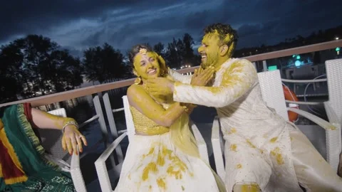 Indian Couple Having Fun Applying Turmer... | Stock Video | Pond5