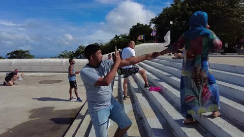 Indian couple taking 'follow me' photo i... | Stock Video | Pond5