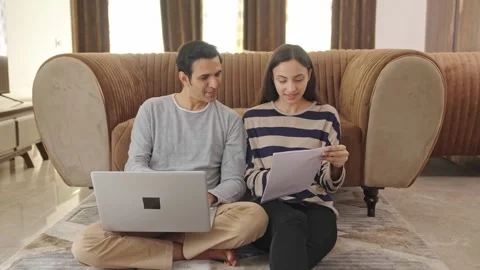 Indian couple working and discussing som... | Stock Video | Pond5