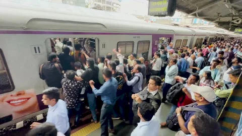 Indian Crowd of people rush to board tra... | Stock Video | Pond5
