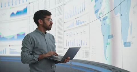 Indian Data Scientist With Laptop Analys... | Stock Video | Pond5