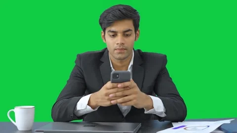 Indian employee using the phone Green sc... | Stock Video | Pond5