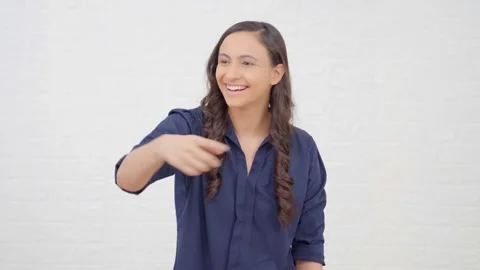 Indian girl inviting people and guests | Stock Video | Pond5