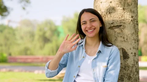 Indian girl saying Hi | Stock Video | Pond5